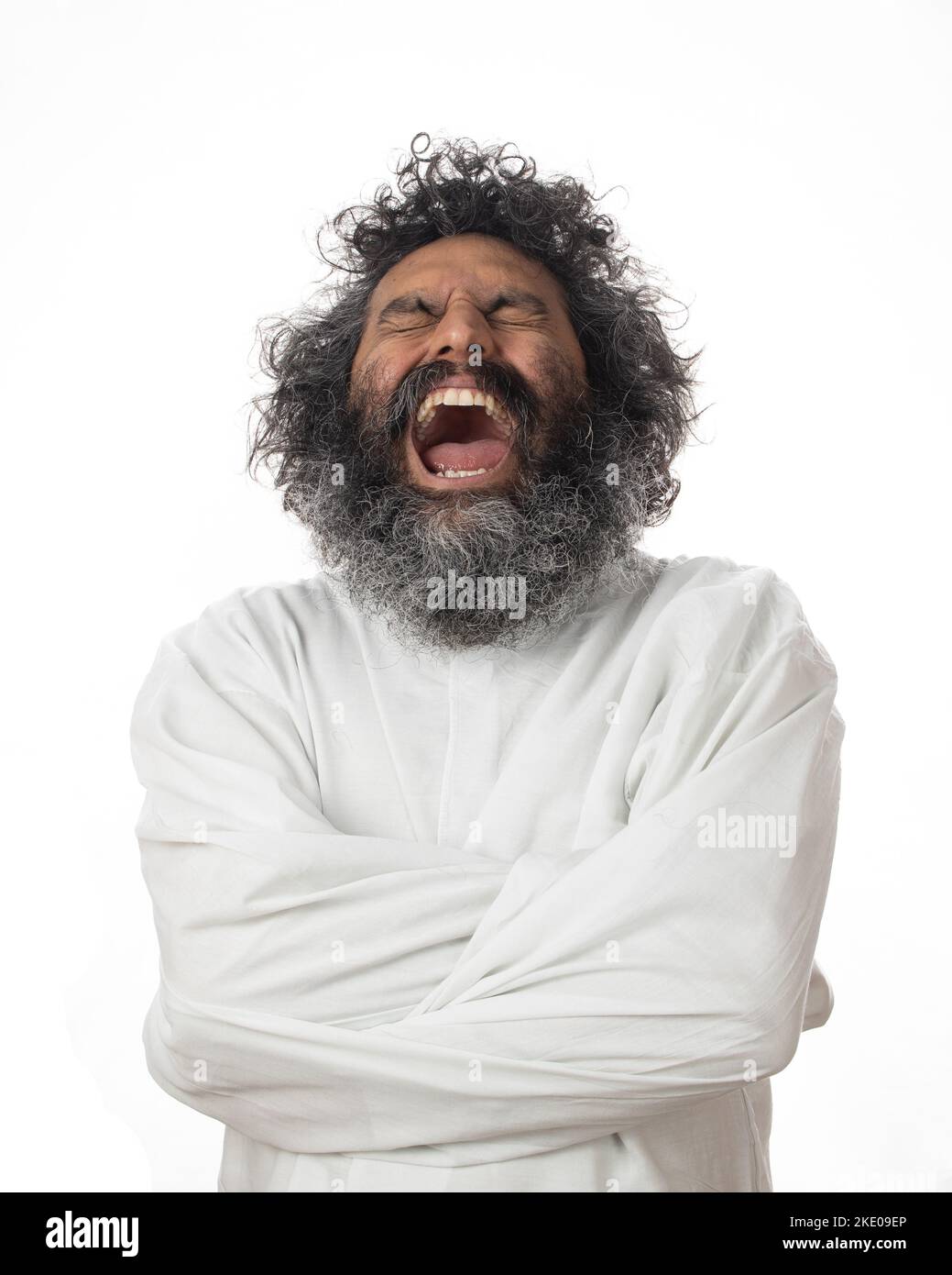 A crazy man expressing anger and discomfort in a straitjacket - the ...