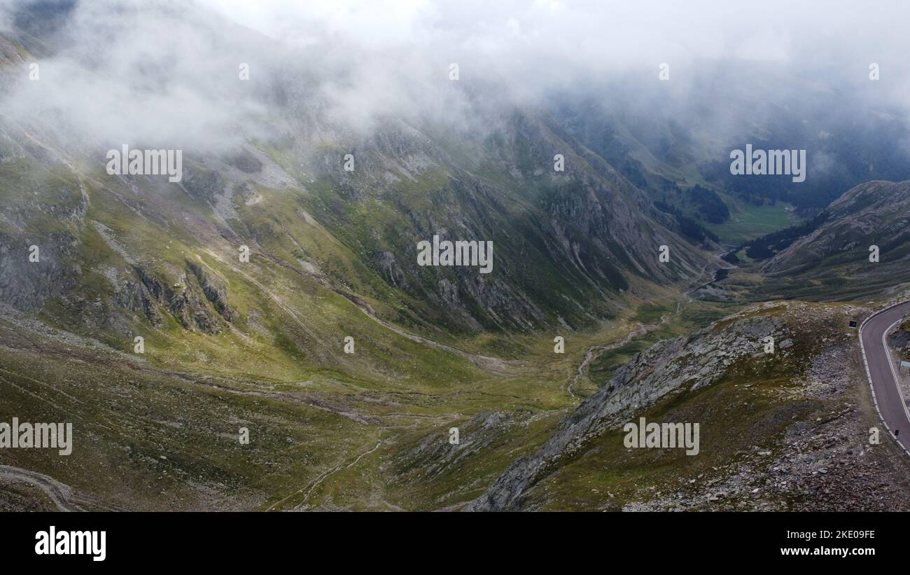 An aerial view of the mountain landscape and the Timmelsjoch pass road ...