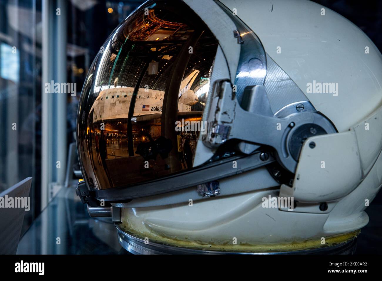 Space Shuttle Discovery reflected in the visor of an astronaut helmet ...