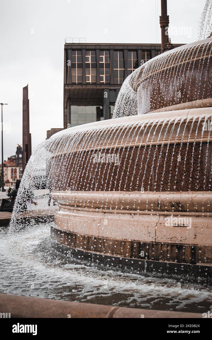 A vertical shot of the fountain in front of the Jan Palach and Jan ...