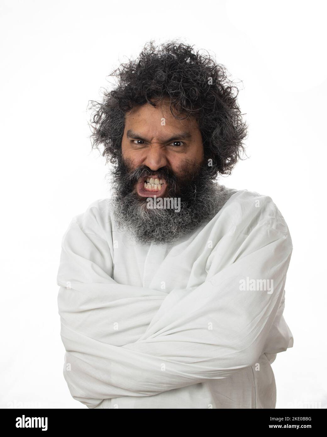 A crazy man expressing anger and discomfort in a straitjacket - the ...