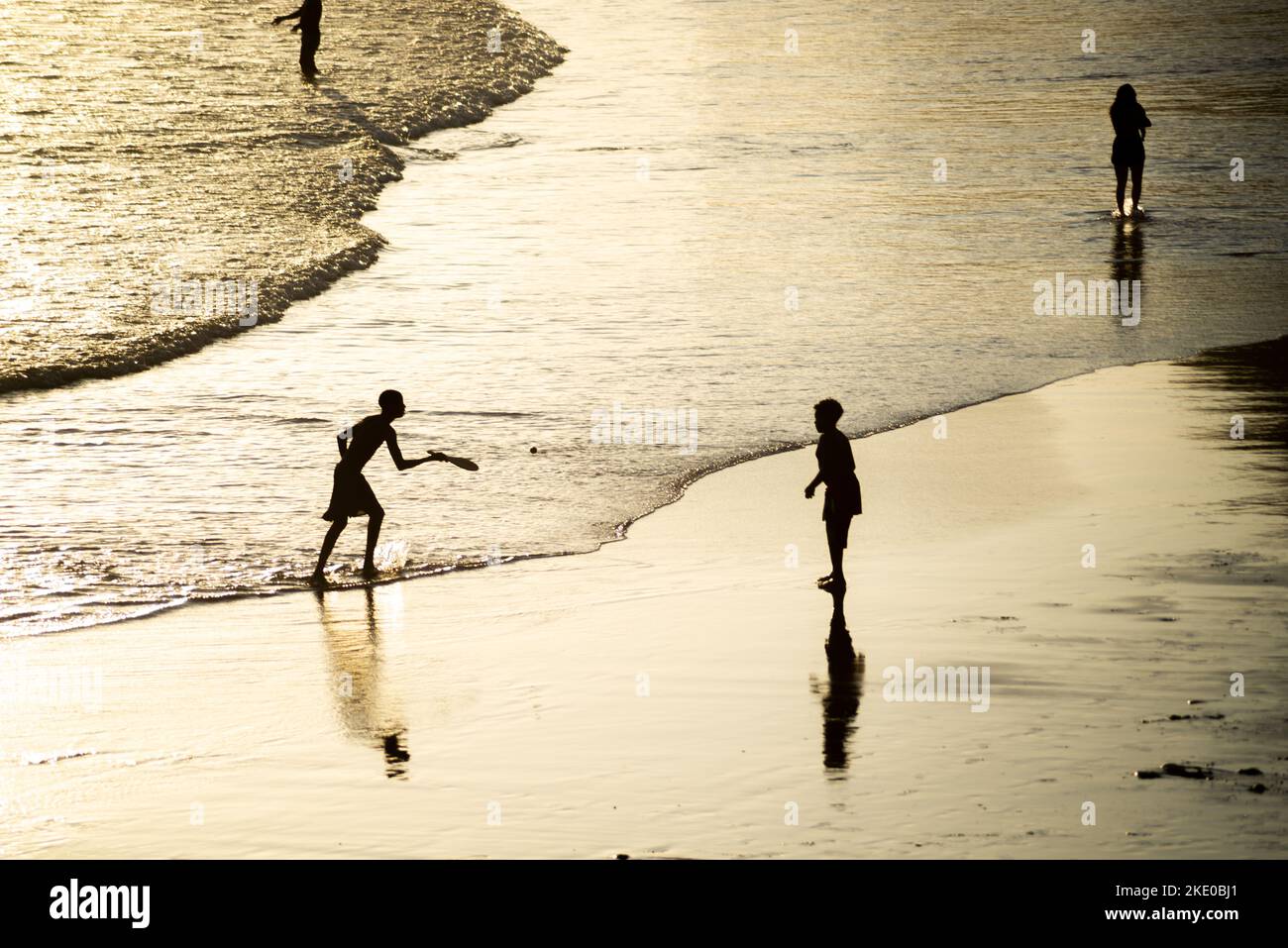 The people walking on the sand of Rio Vermelho beach in Salvador, Bahia ...