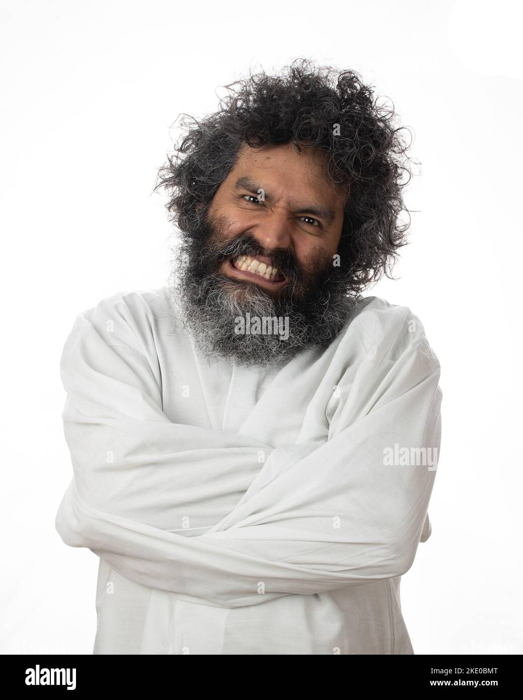 A crazy man expressing anger and discomfort in a straitjacket - the ...