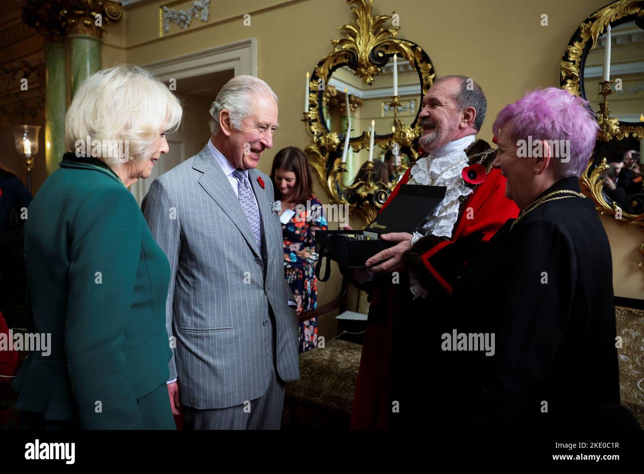 Civic Mayor Ian Pearson (second right) gifts a box of honey to King ...