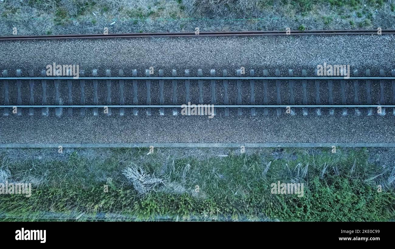 The view of the railroad with green vegetation from a drone Stock Photo ...