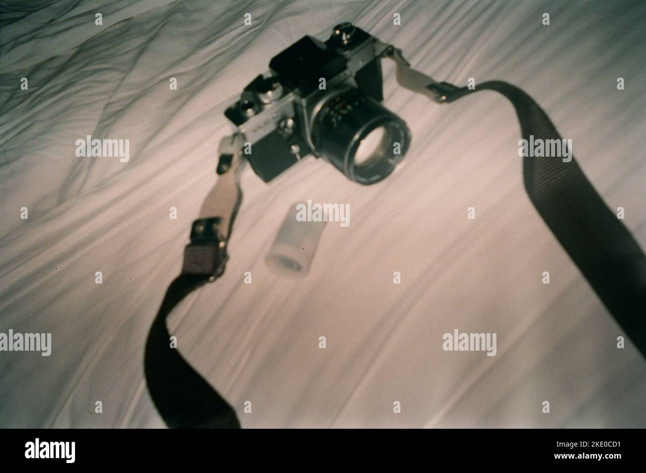 Indoor shot taken with old-fashioned camera of another black analog ...