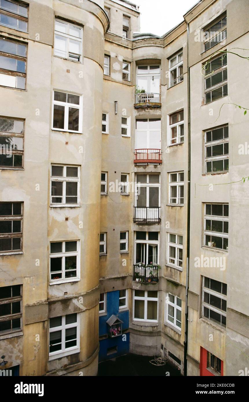 Outdoor shot of the inside of closed estate. Block of flats building ...