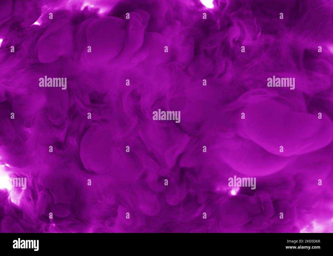 A smoke like shot of purple ink in water for cool background Stock ...