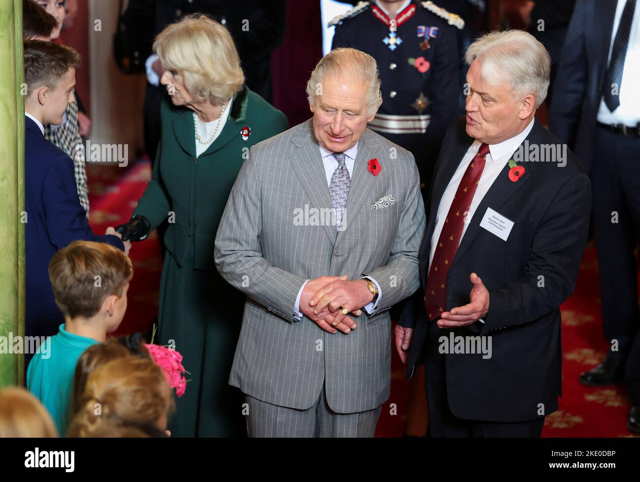 King Charles III and the Queen Consort with Damian Allen, chief ...