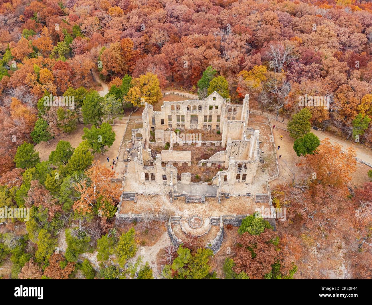 Aerial view of the fall color of Lake Ozark and the castle ruins at ...