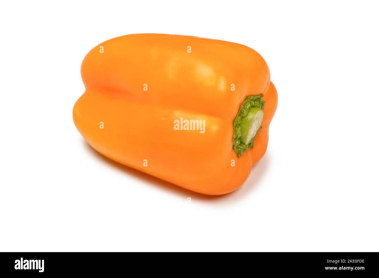 Orange bell pepper isolated on a white background. Top view. Copy space ...
