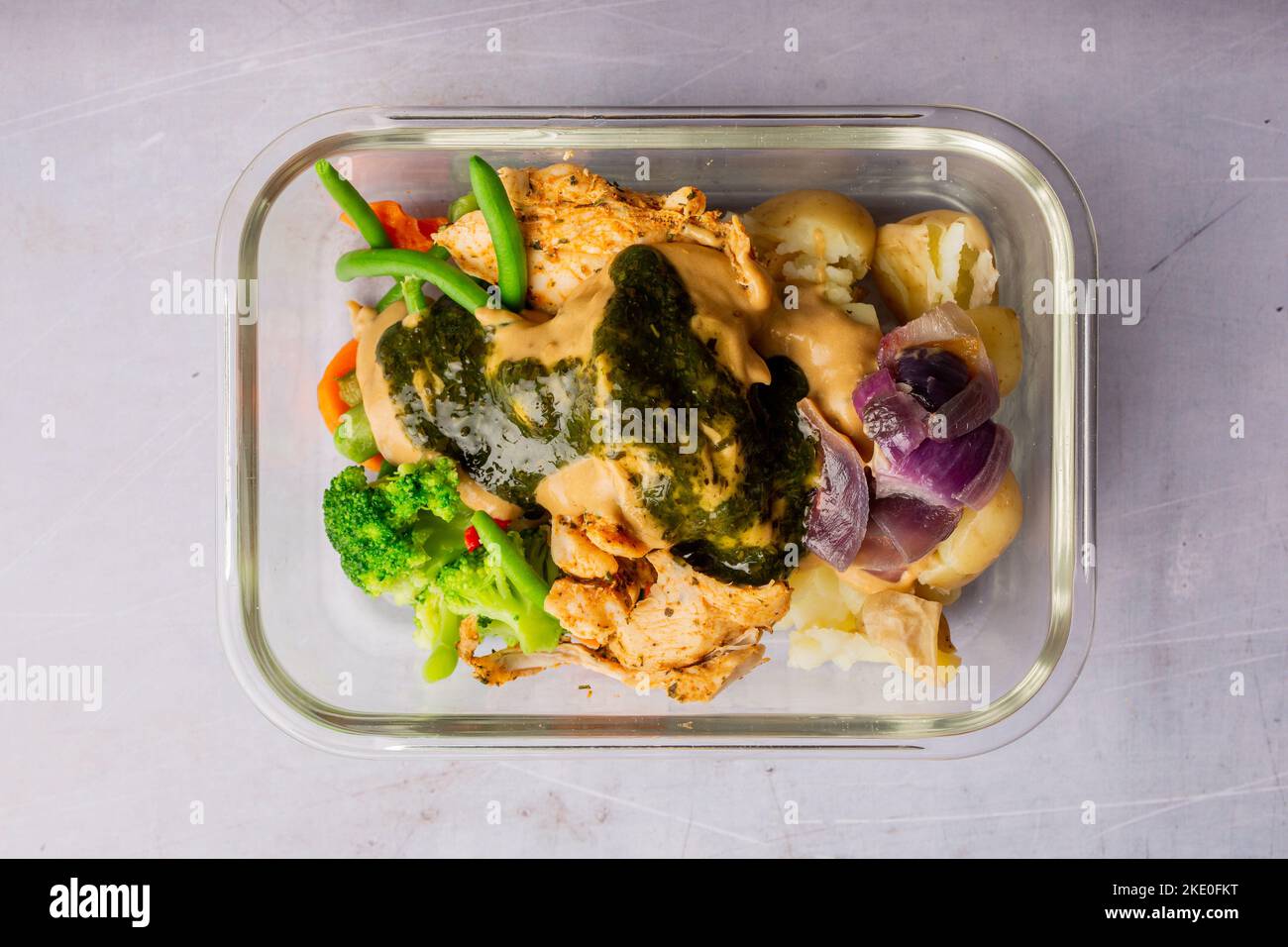 A top view of a colorful dish of chicken and vegetables served with ...