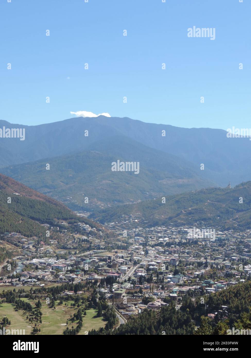 View of Bhutan's landscape with mountain and deep valleys with houses ...