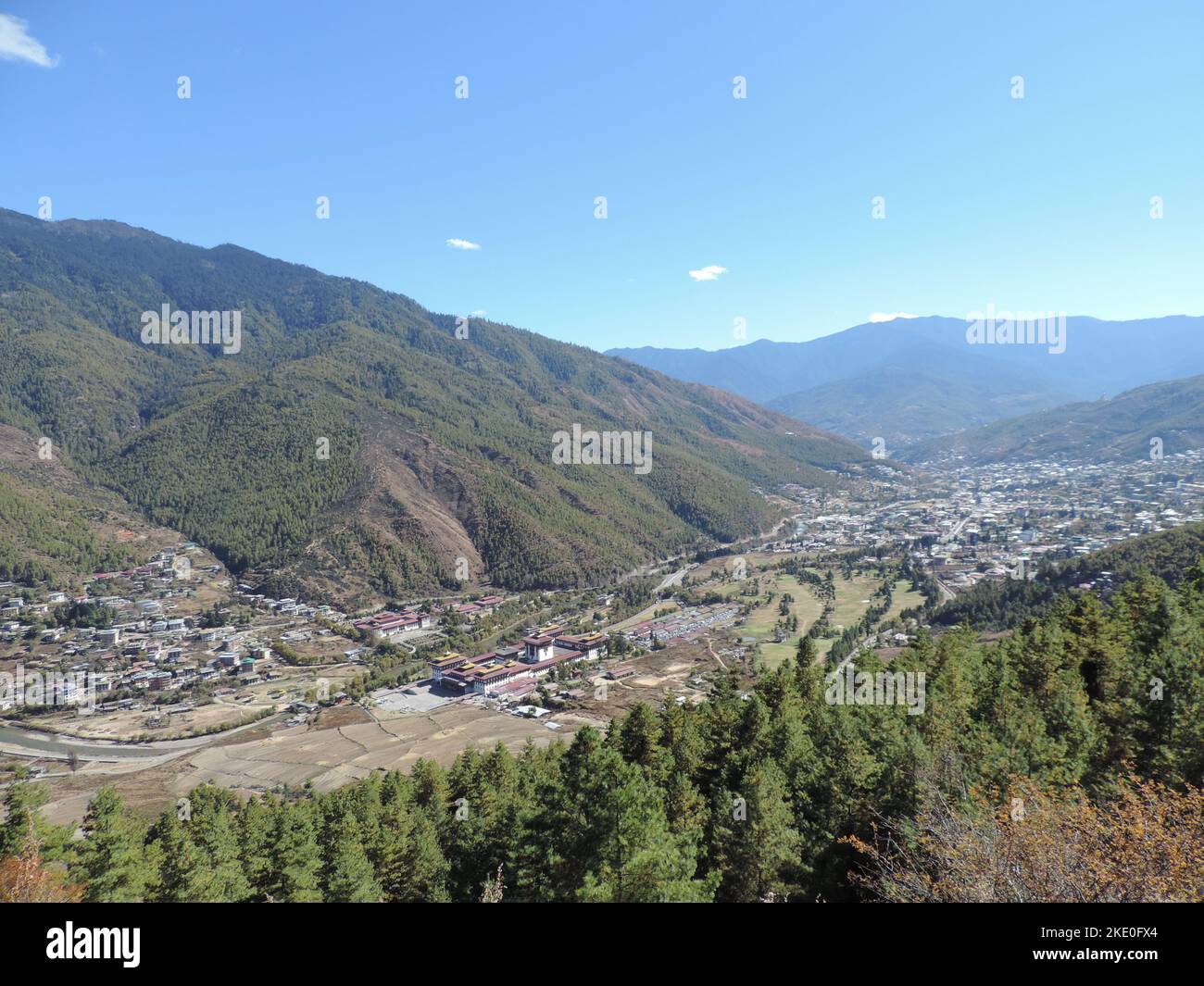 View of Bhutan's landscape with mountain and deep valleys with houses ...