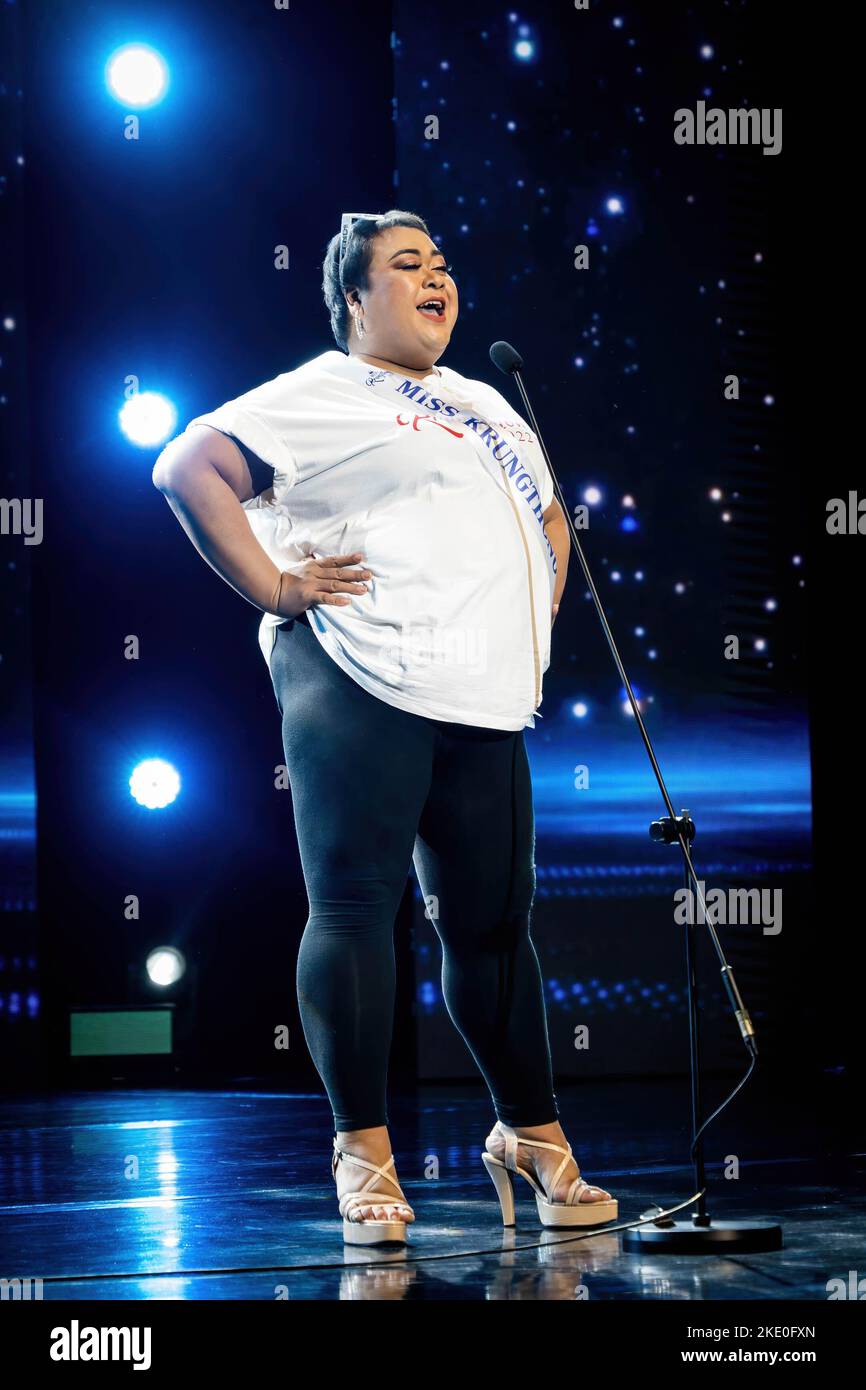 A contestant in Miss Plus Size Thailand introduces themselves on stage ...