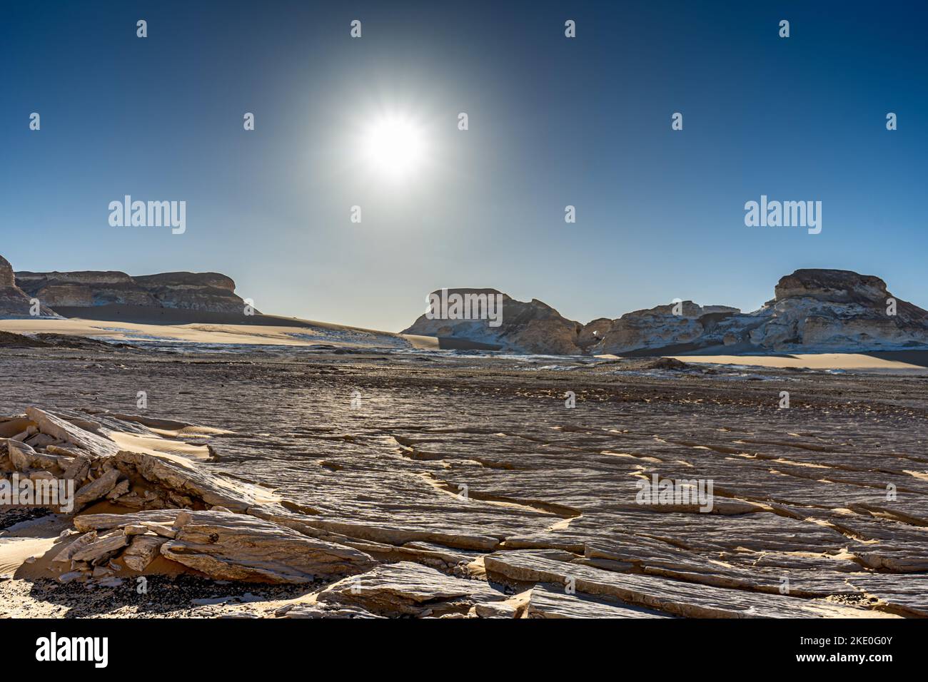 The view of the desert with cliffs against the background of the blue sky with shining sun Stock ...