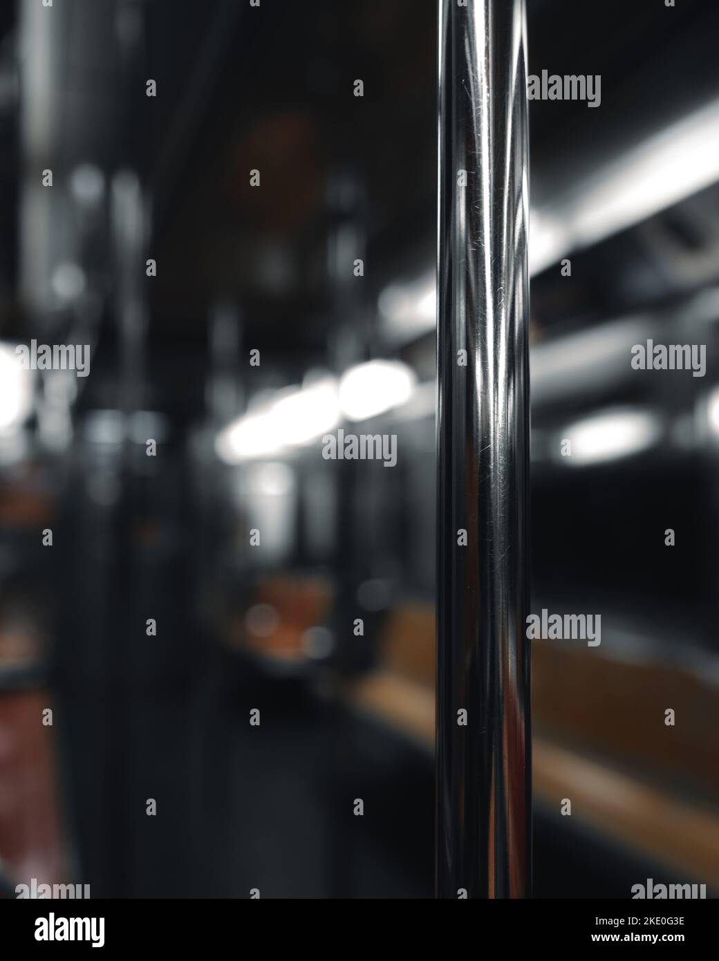 The interior of a metro car of the new york subway focussed on a hand ...