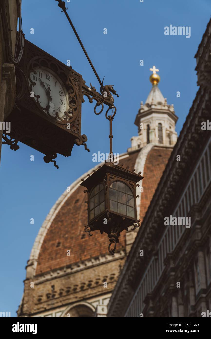 Close up shot of an old clock in front of the cathedral santa maria in ...