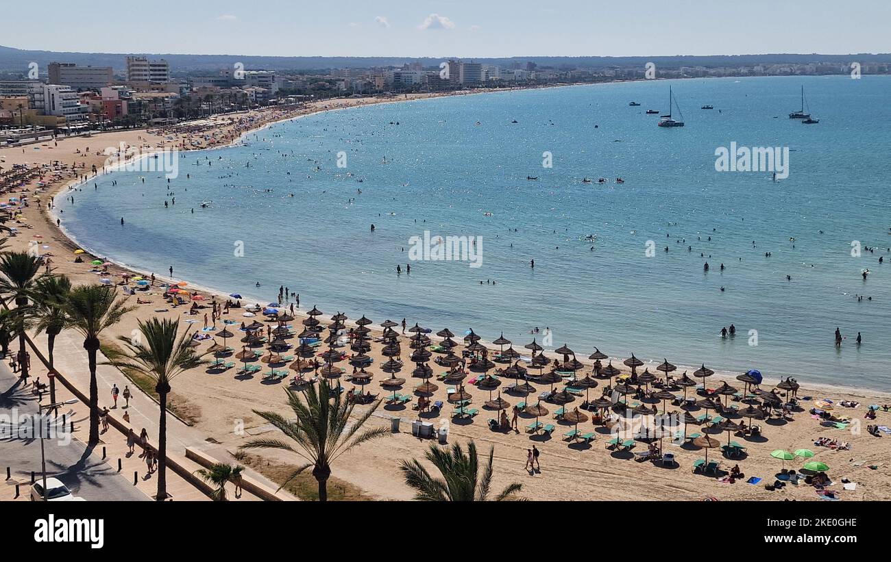 An aerial view of people vacationing at Playa de Palma beach resort in ...