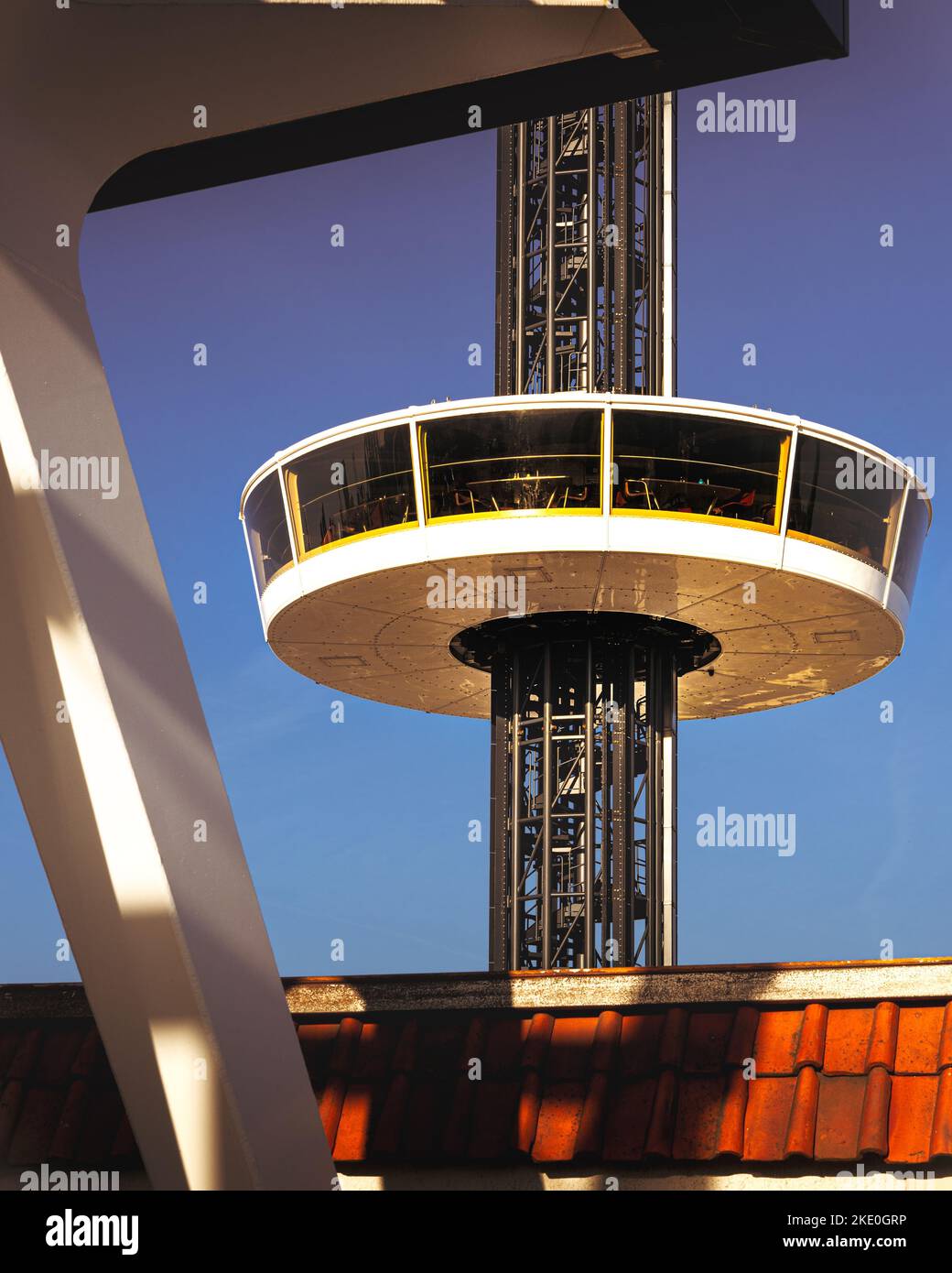 The view of a circular restaurant built around a tower before the blue ...