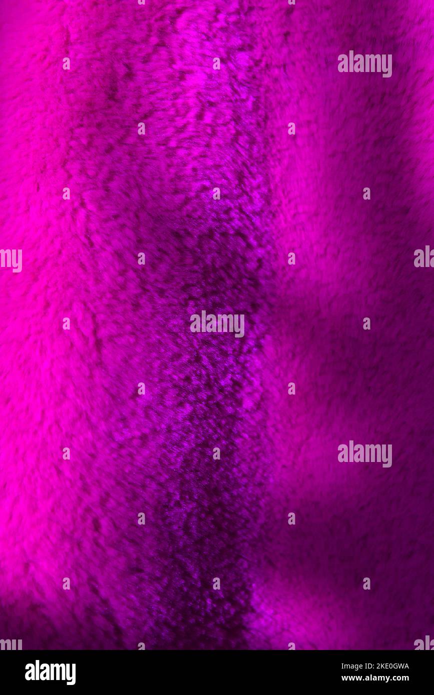 Tree branch shadow falls on pink furry fabric background Stock Photo ...