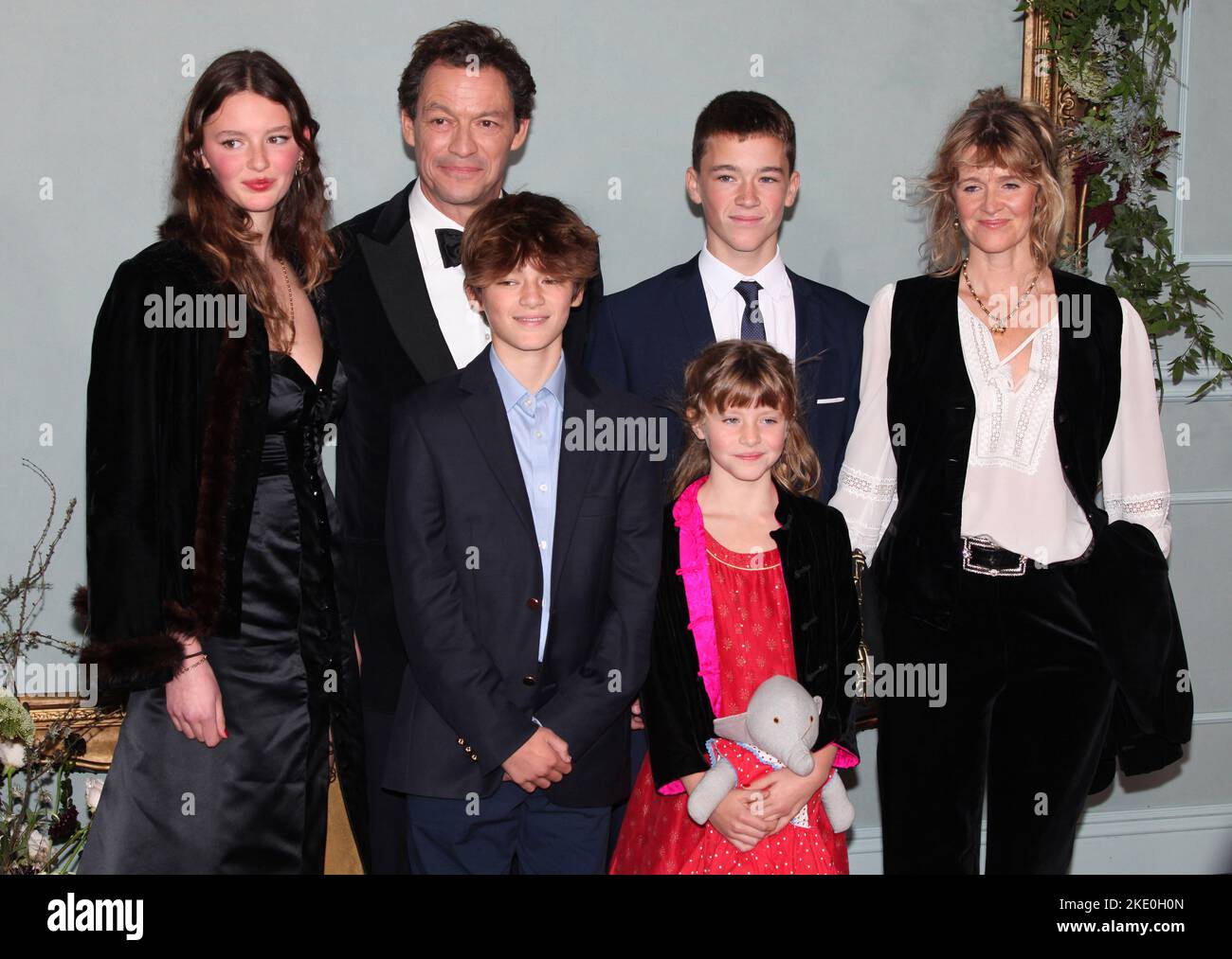 London, UK. Dominic West with son Senan West and larger family at the ...
