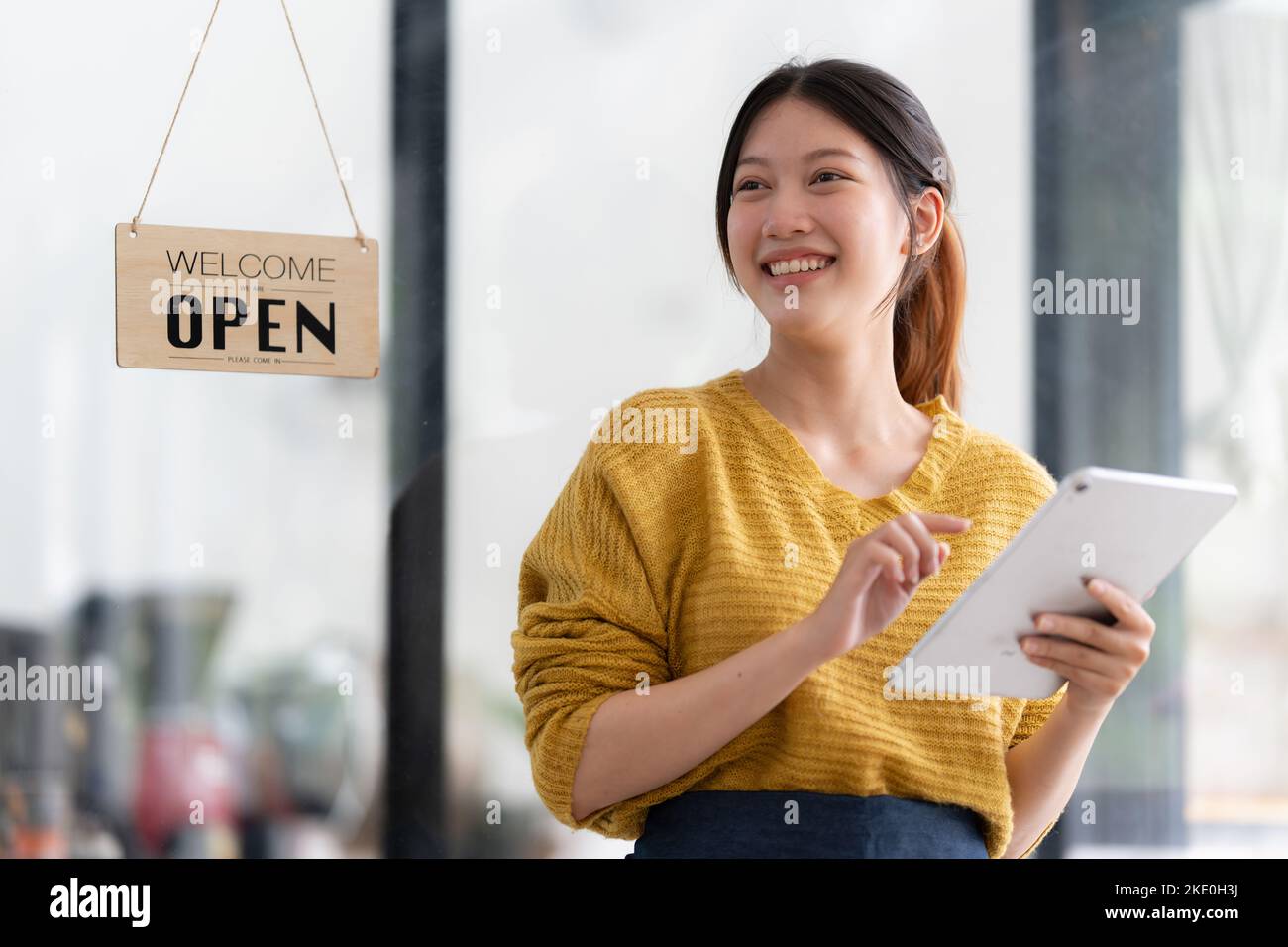 Portrait of Startup successful small business owner in coffee shop. SME ...