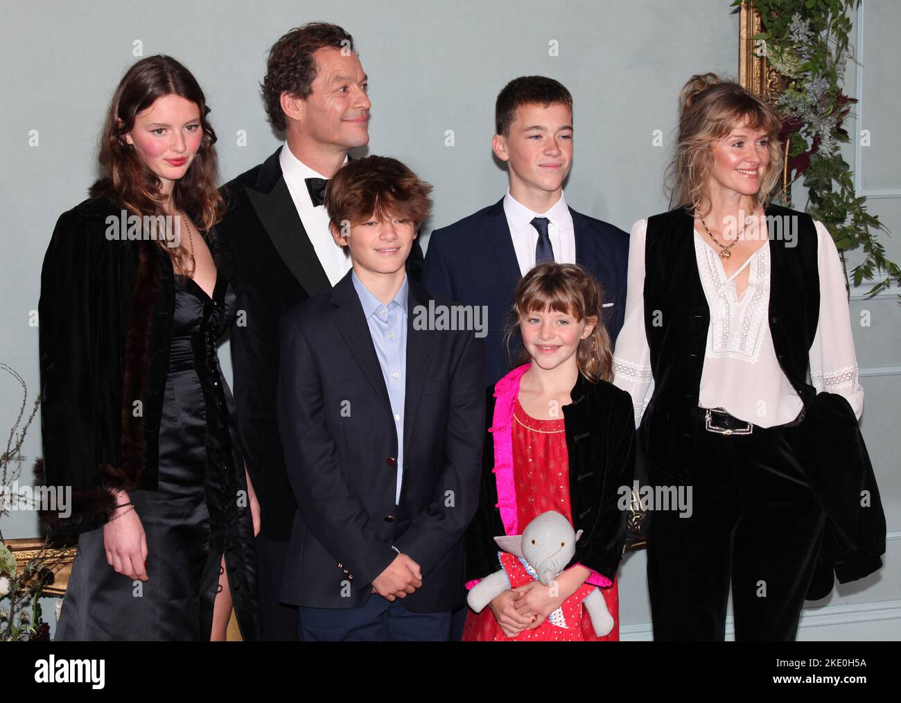 London, UK. Dominic West with son Senan West and larger family at the ...