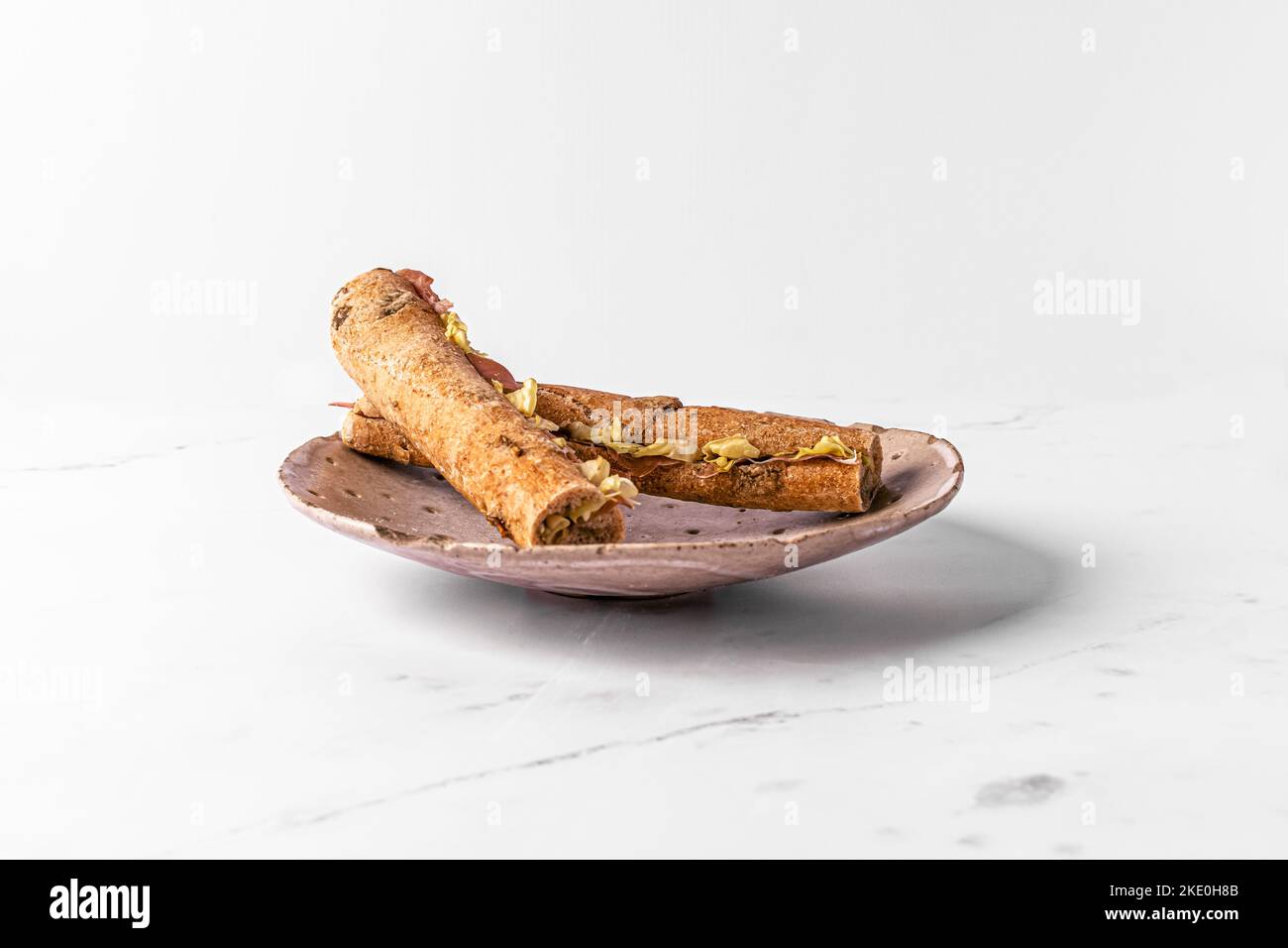 Delicious sandwich with natural organic bread, ham, herbs and spices ...