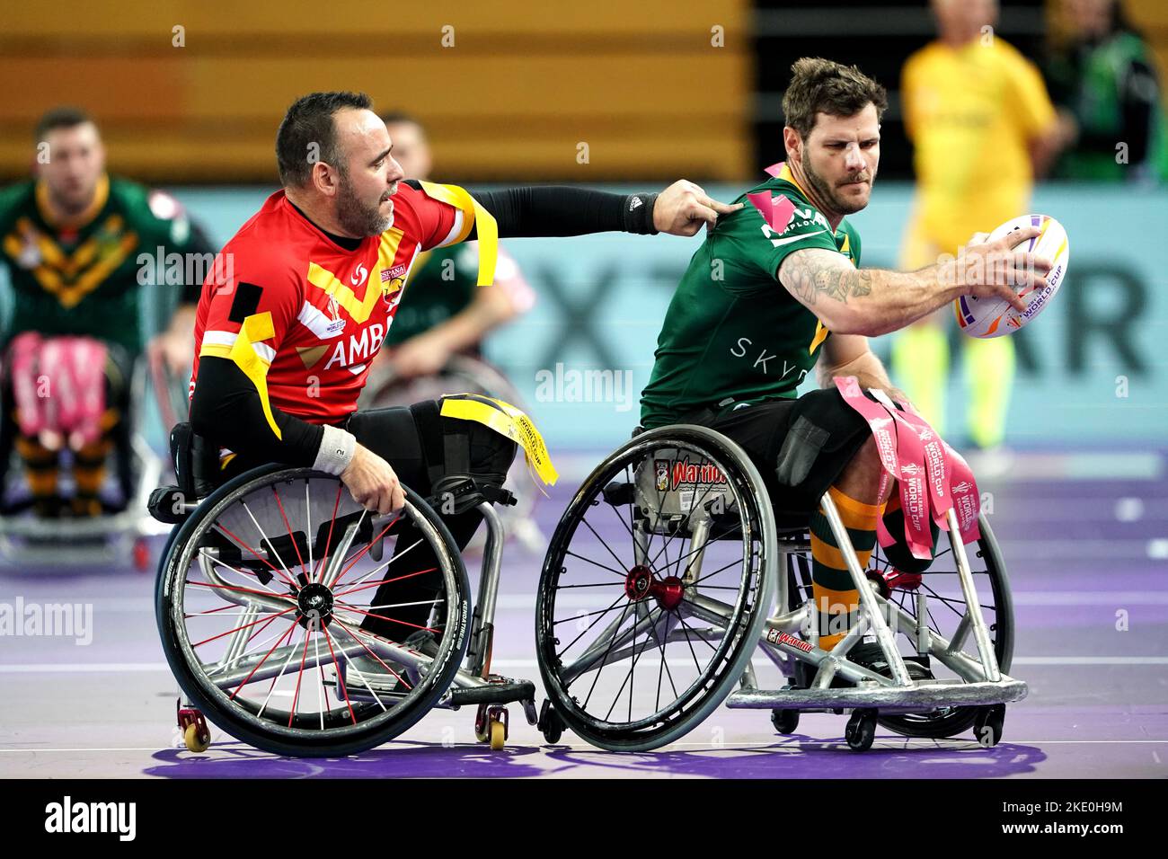 Australia's Adam Tannock is tackled by Spain's Joel Lacombe (left ...