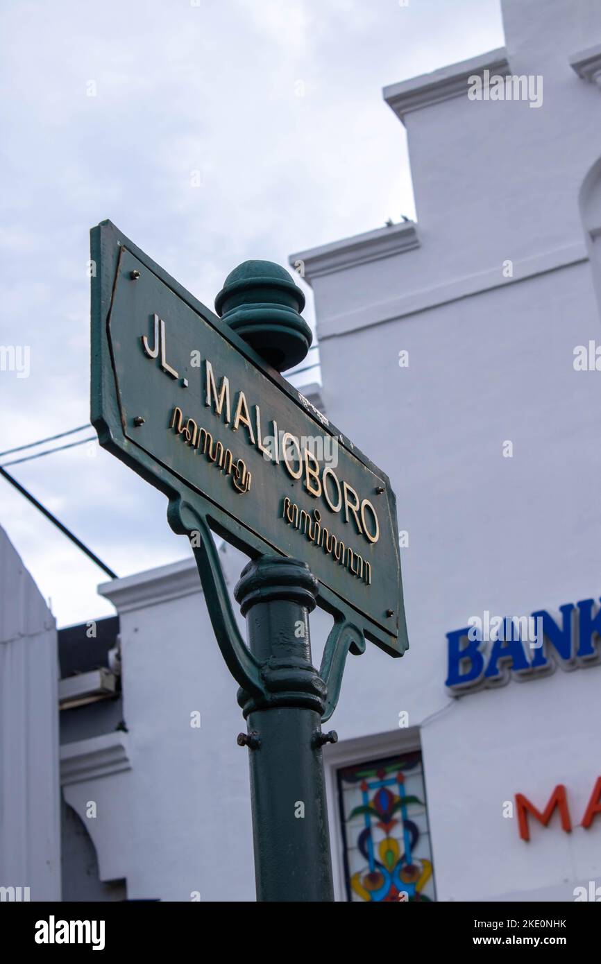 A low angle of a street sign of focus Malioboro in Jogjakarta ...