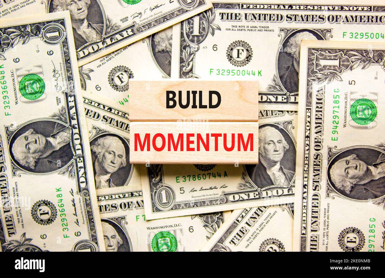 Build momentum symbol. Concept words Build momentum on wooden blocks ...