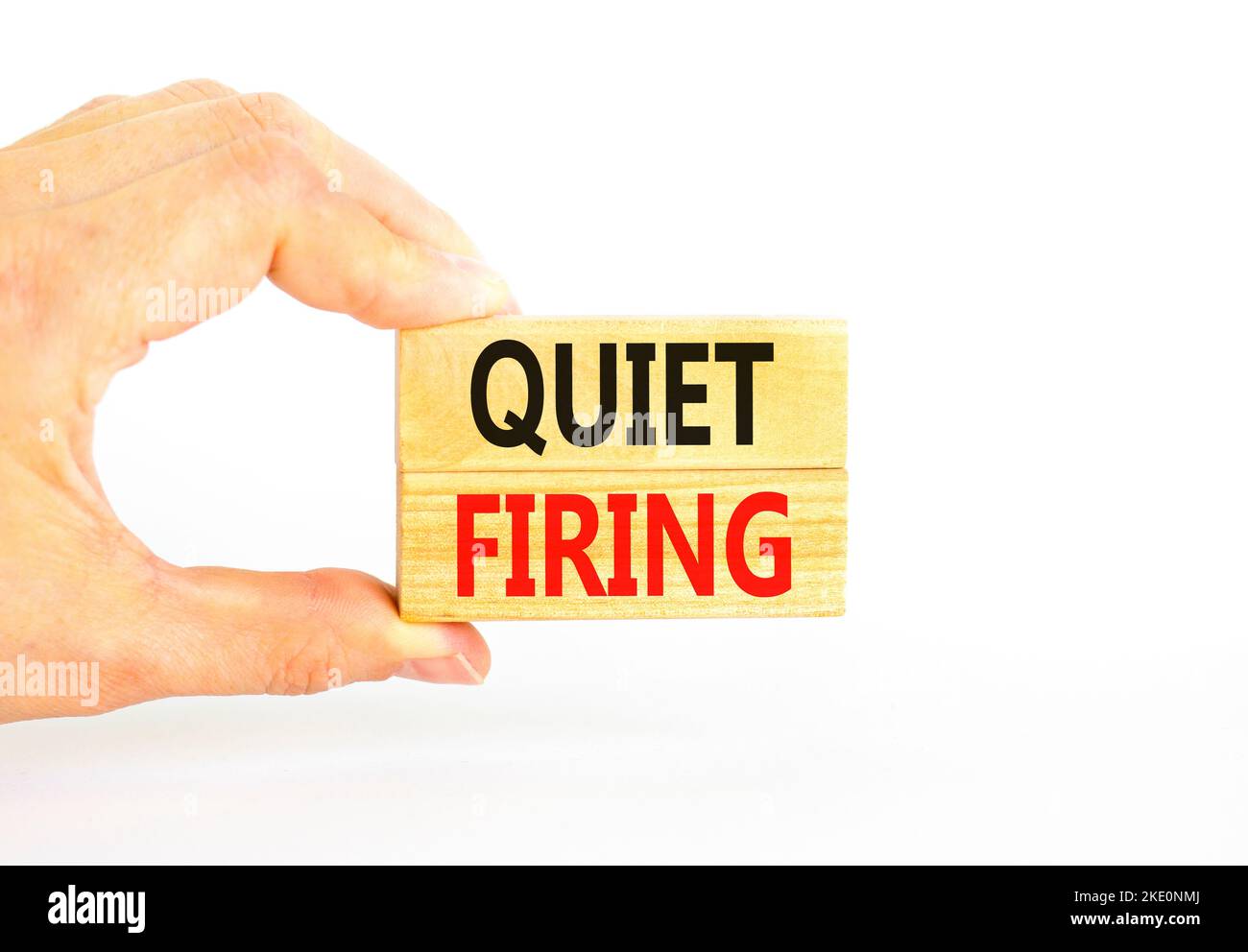 Quiet firing symbol. Concept words Quiet firing on wooden blocks ...