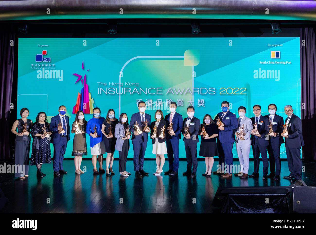 The assembled award winners with their trophies at the Hong Kong ...