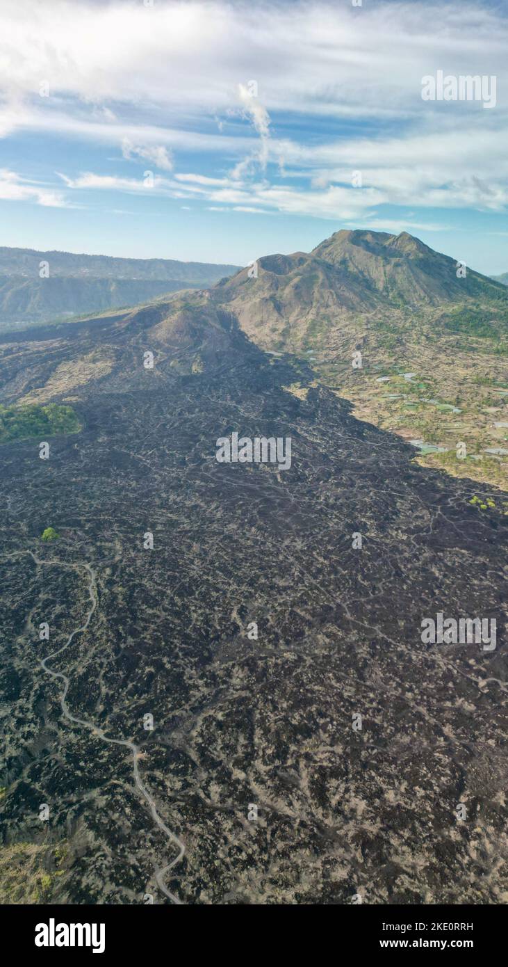A vertical aerial view of cliffs and mountains in Bali, Indonesia Stock ...