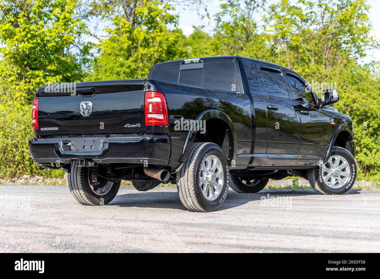 The black 5th Generation Dodge Ram car parked on the street Stock Photo ...