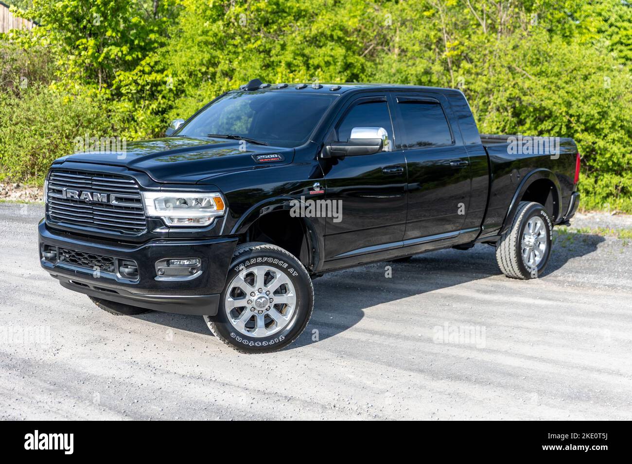 The black 5th Generation Dodge Ram car parked on the street Stock Photo ...