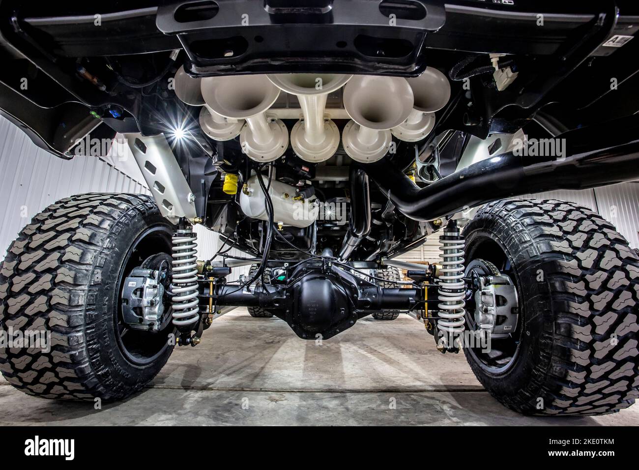 The underside of a lifted Ford F350 with train horns Stock Photo - Alamy