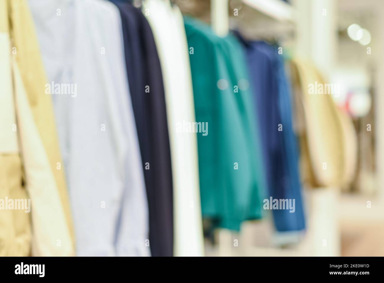 blur of fashion clothes shop interior in shopping mall. wardrobe Stock ...