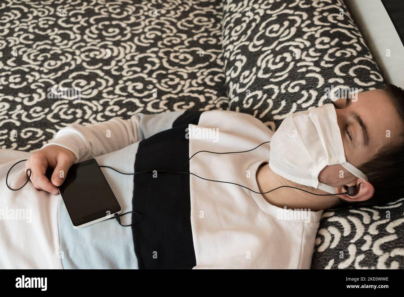 Young man phone 19 home hi-res stock photography and images - Alamy