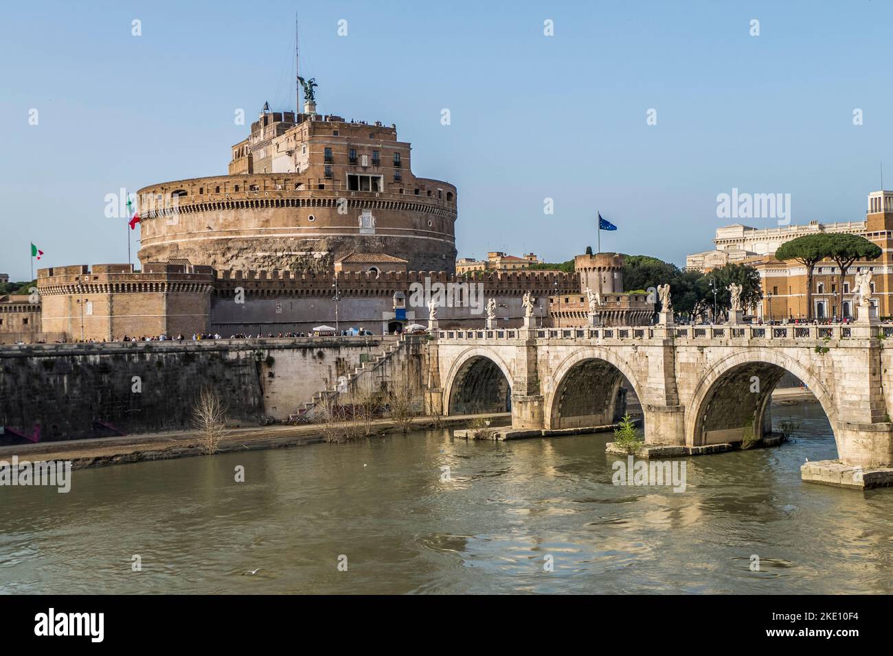 The Tevere River with Castle Sant'Angelo in background and a blue sky ...