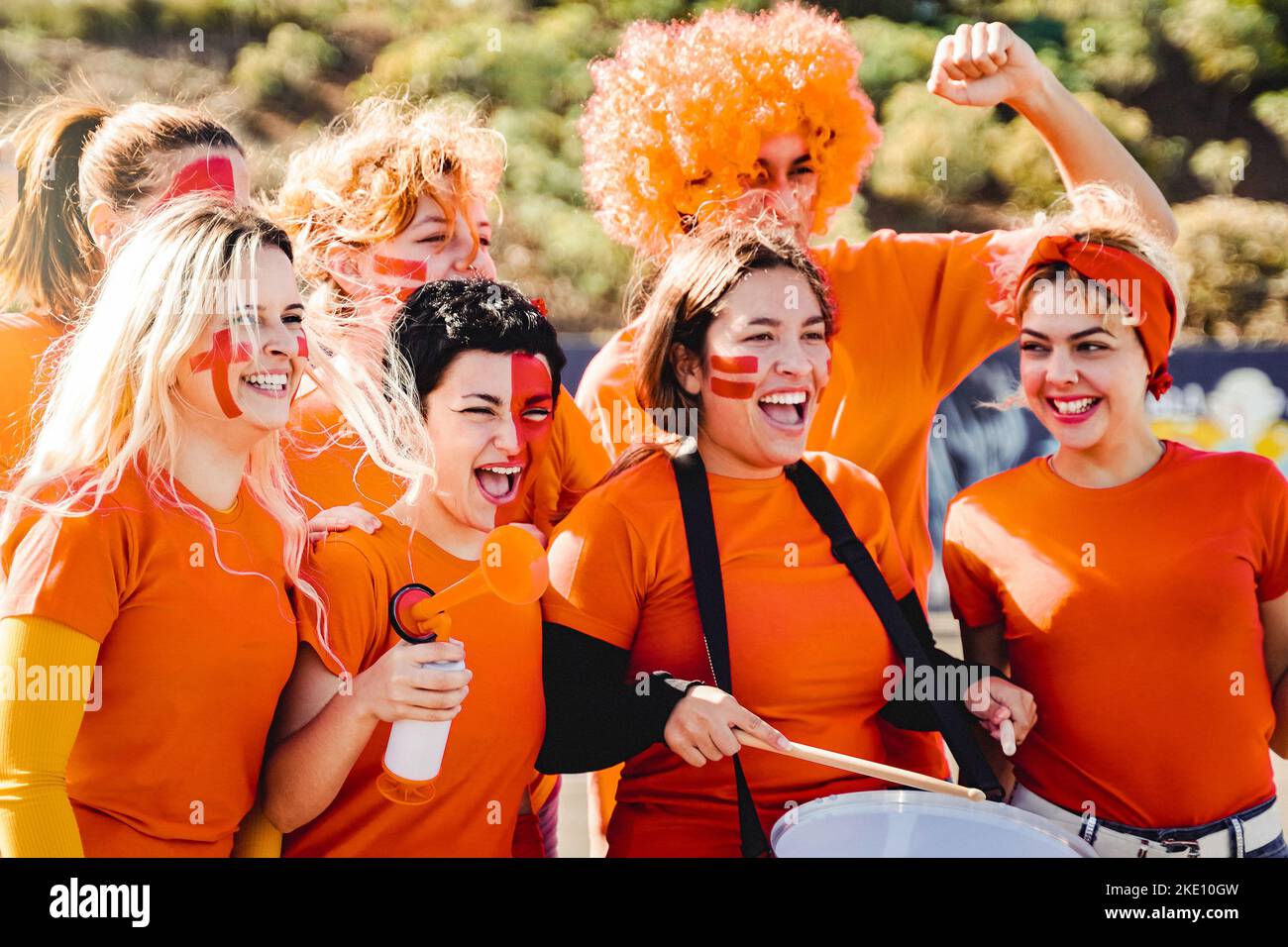 Orange sport football fans celebrating team victory in championship ...
