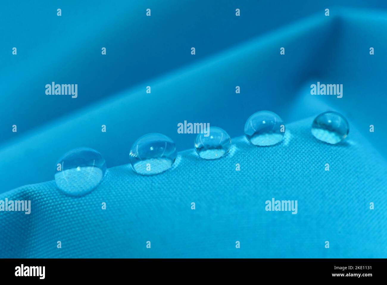 Drops of water on textiles. Waterproof fabric with drops on the surface ...