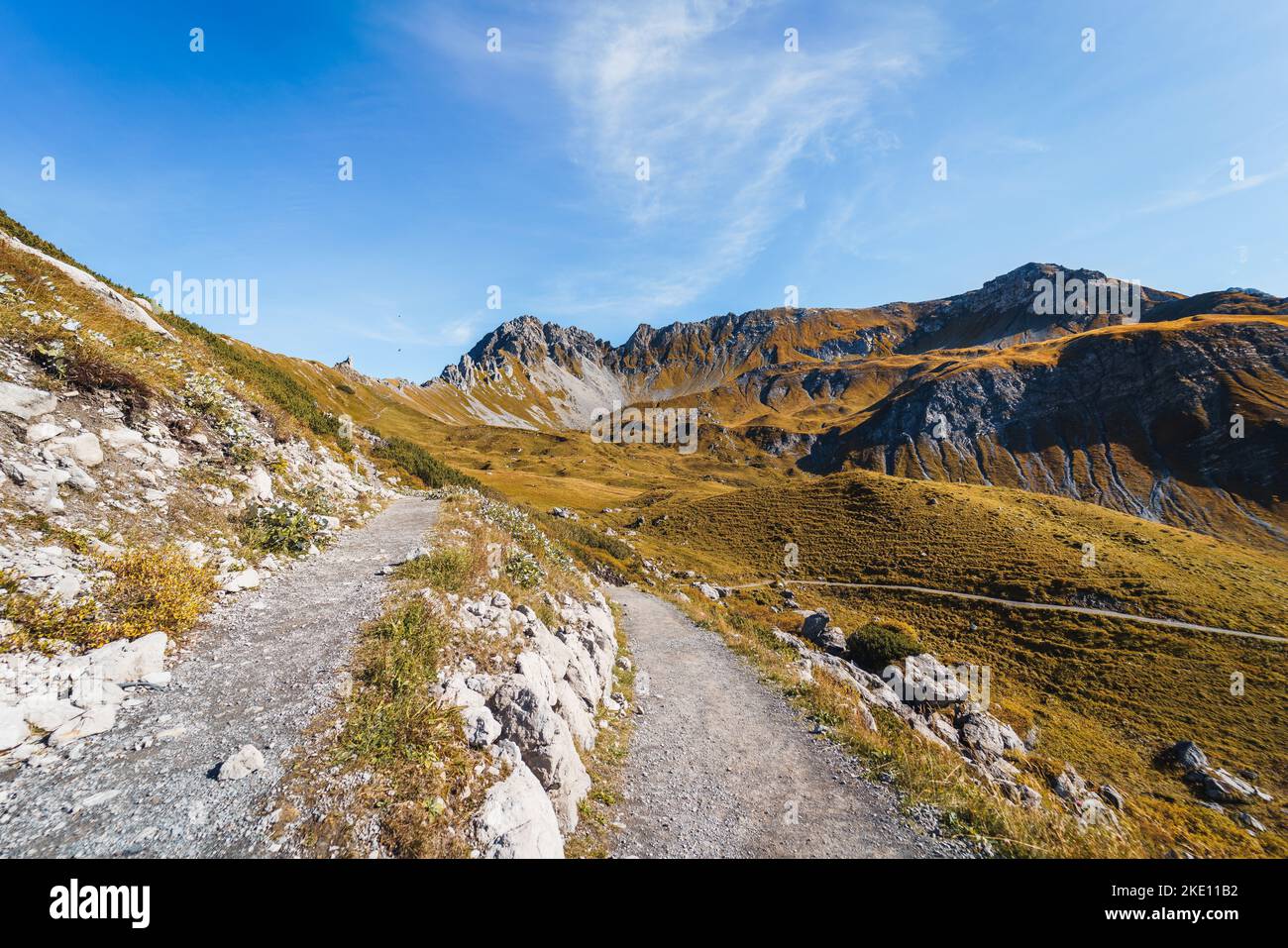 A scenic shot of hills, mountains, and trails in Vorarlberg, Austria ...