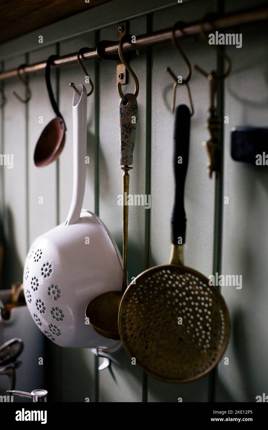 Kitchen equipment hanging on hi-res stock photography and images - Alamy