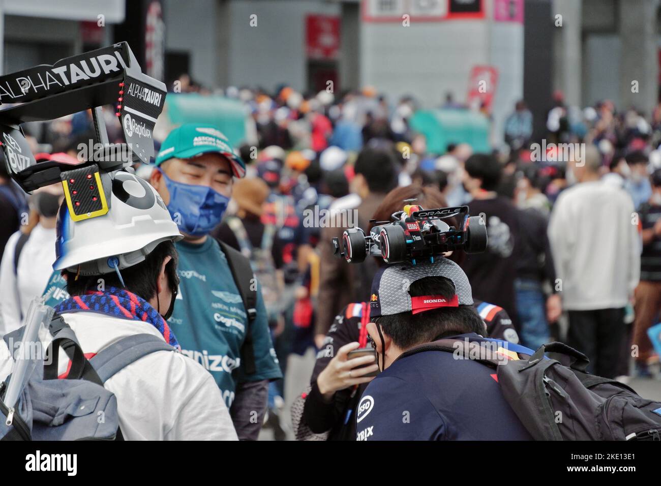 Japanese F1 fan wearing F1 car hat Stock Photo - Alamy