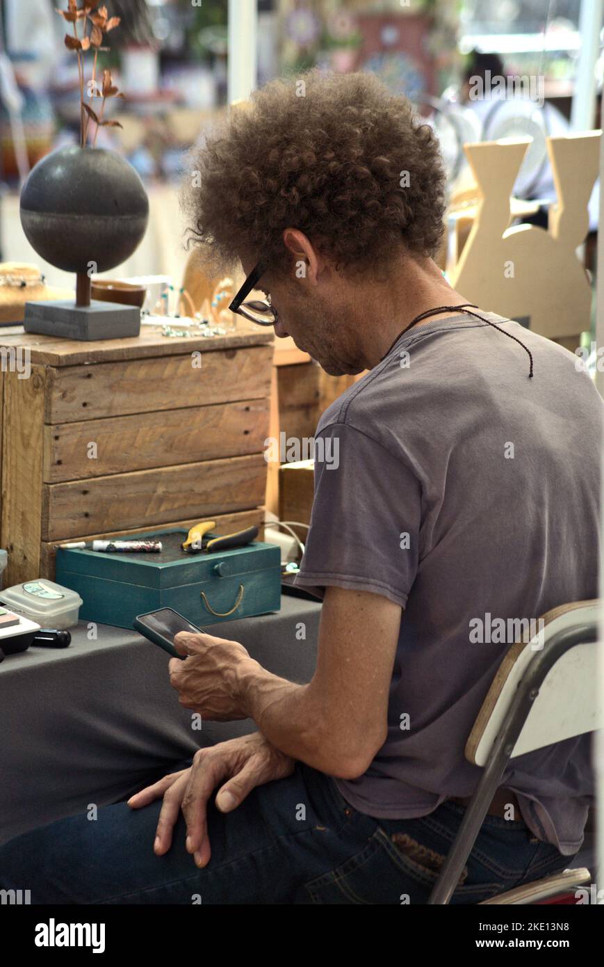 Male stallholder working or at work hi-res stock photography and images ...
