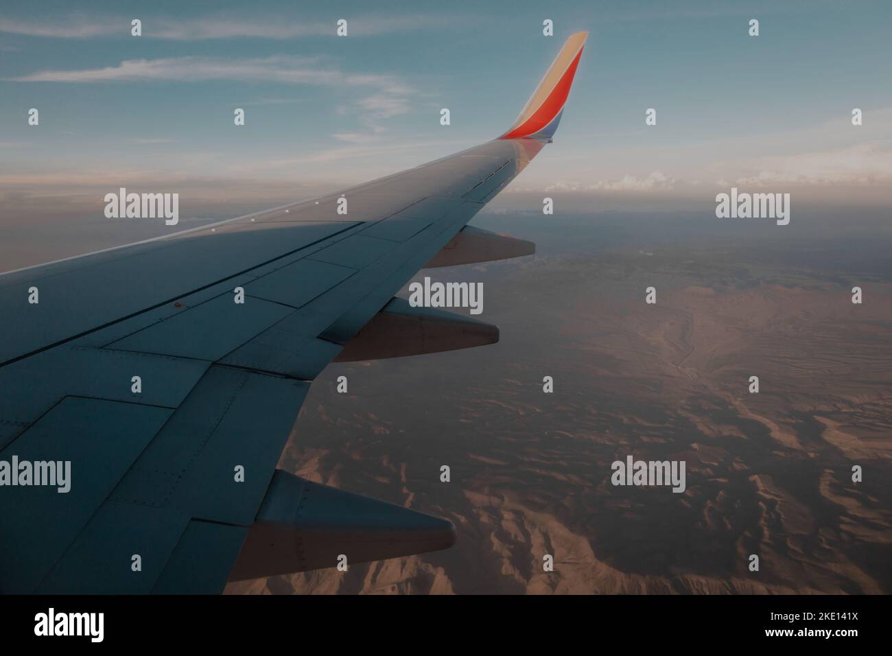 A view of a plane wing from the airplane window Stock Photo - Alamy