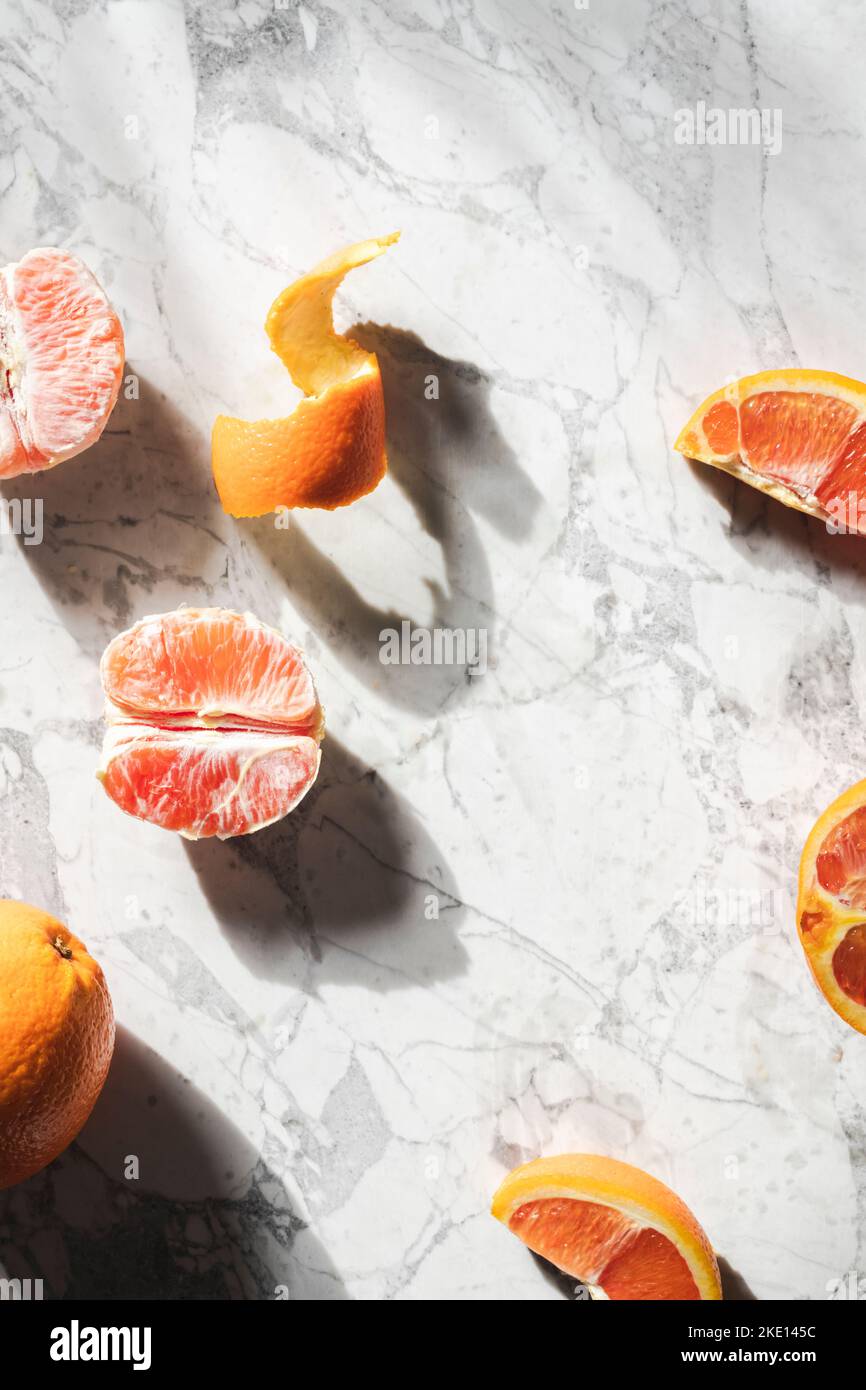 Minimal Red Navel Orange Flat Lay on White Marble Stock Photo - Alamy