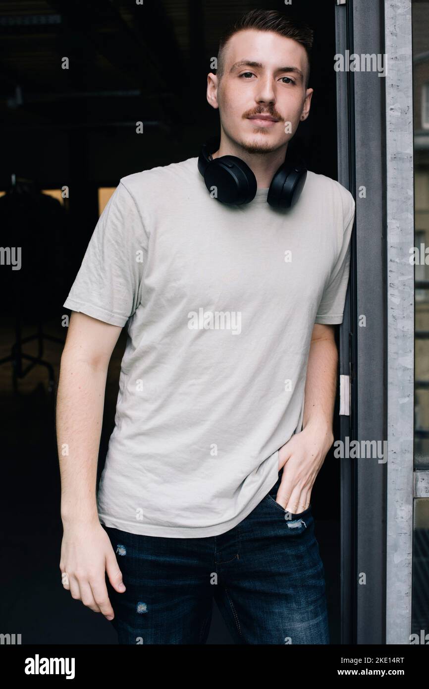 Headphones around neck hi-res stock photography and images - Alamy